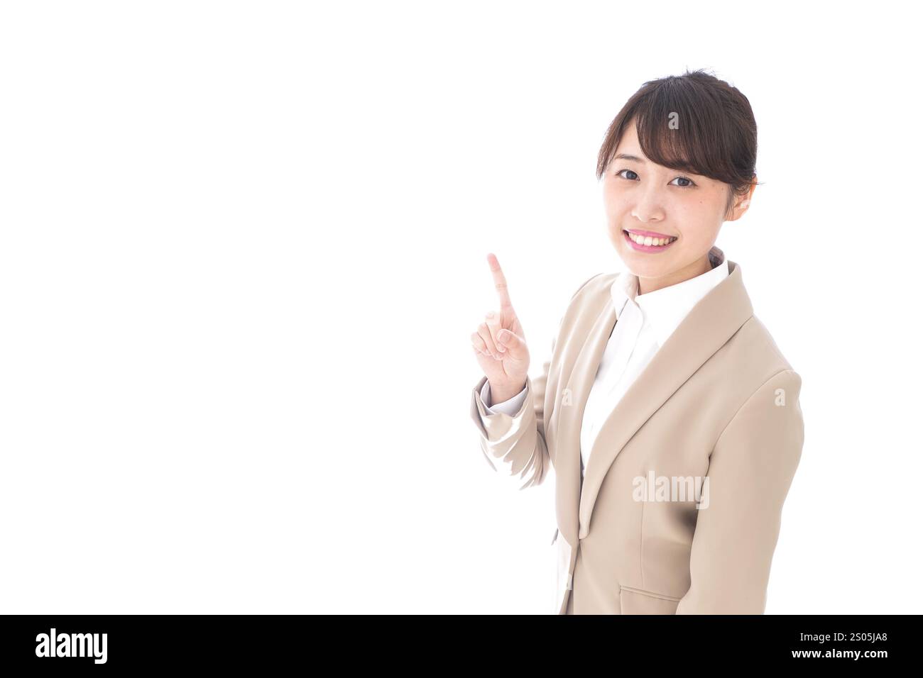 Young woman pointing Stock Photo - Alamy