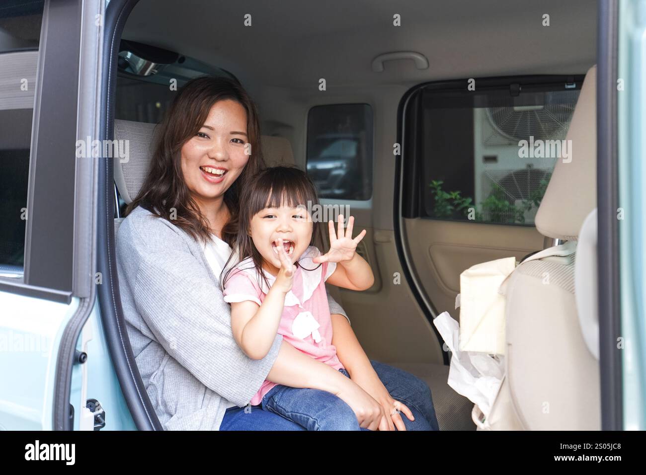 Children in a car Stock Photo - Alamy