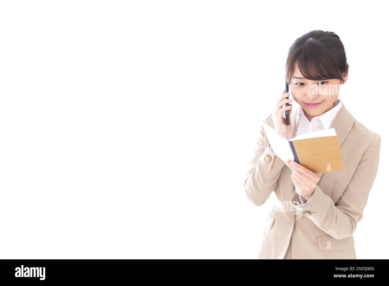 Businesswoman making a phone call Stock Photo - Alamy