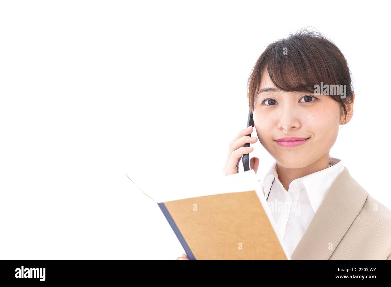 Businesswoman making a phone call Stock Photo - Alamy