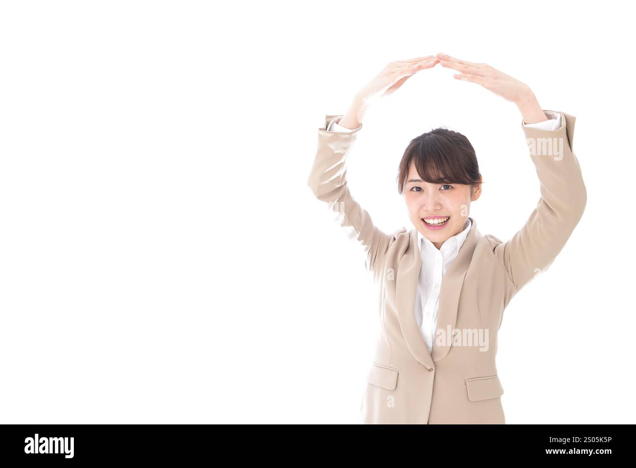 Businesswoman giving the OK sign Stock Photo - Alamy
