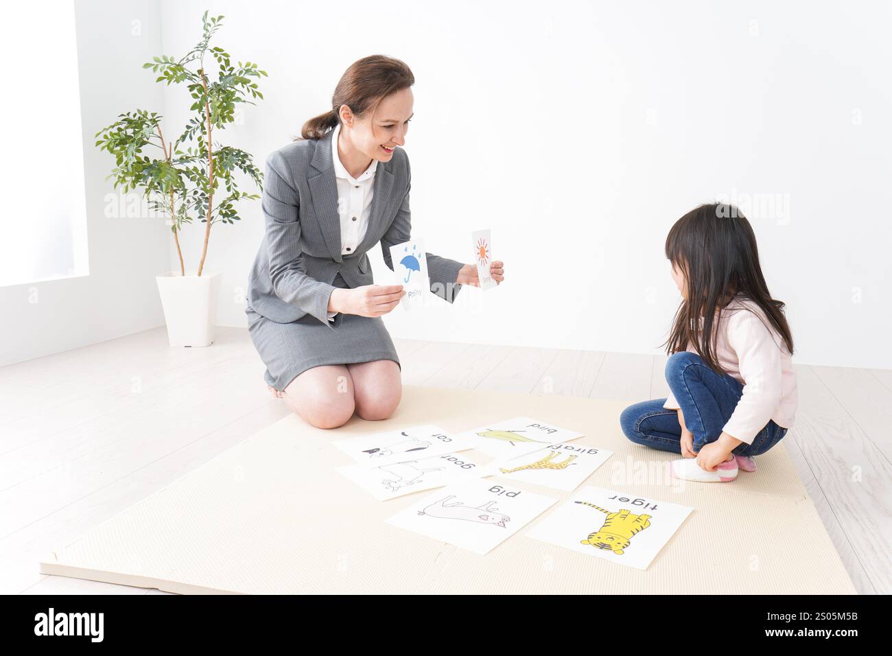 Children taking English conversation lessons Stock Photo - Alamy