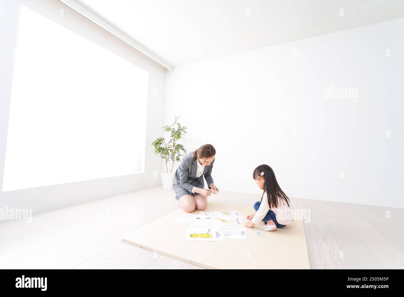 Children taking English conversation lessons Stock Photo - Alamy
