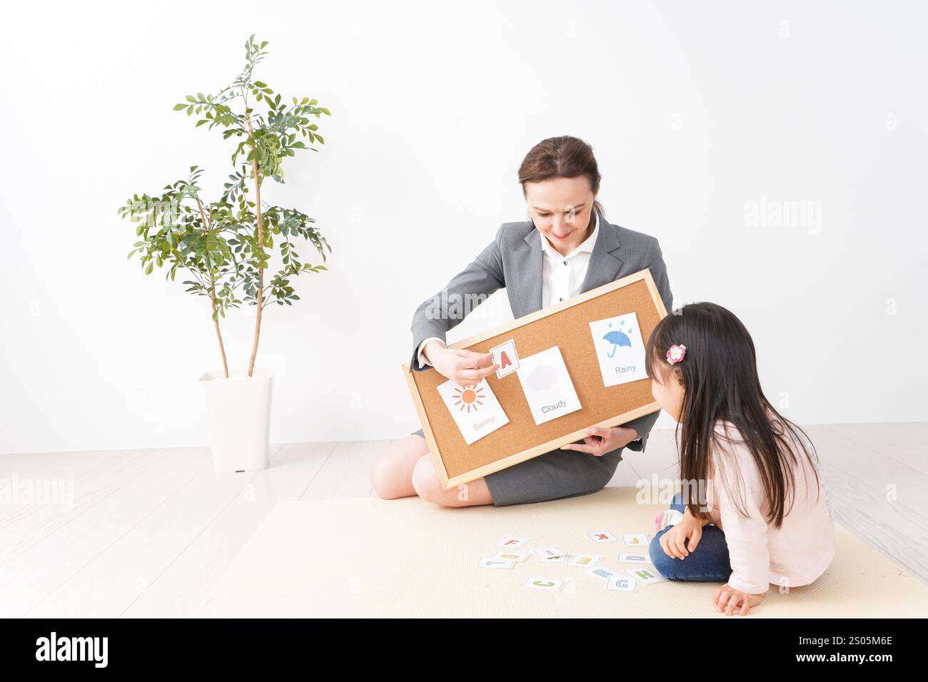 Children taking English conversation lessons Stock Photo - Alamy