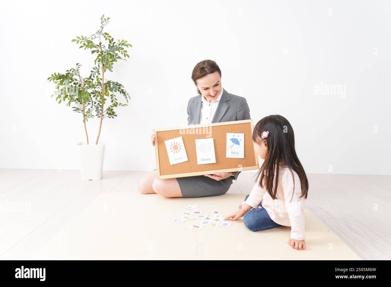Children taking English conversation lessons Stock Photo - Alamy