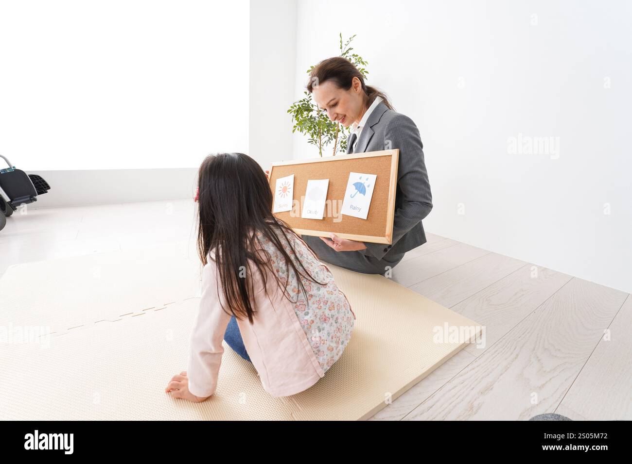 Children taking English conversation lessons Stock Photo - Alamy