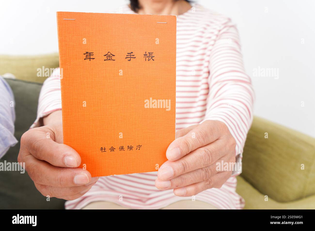 Elderly couple with pension book Stock Photo - Alamy