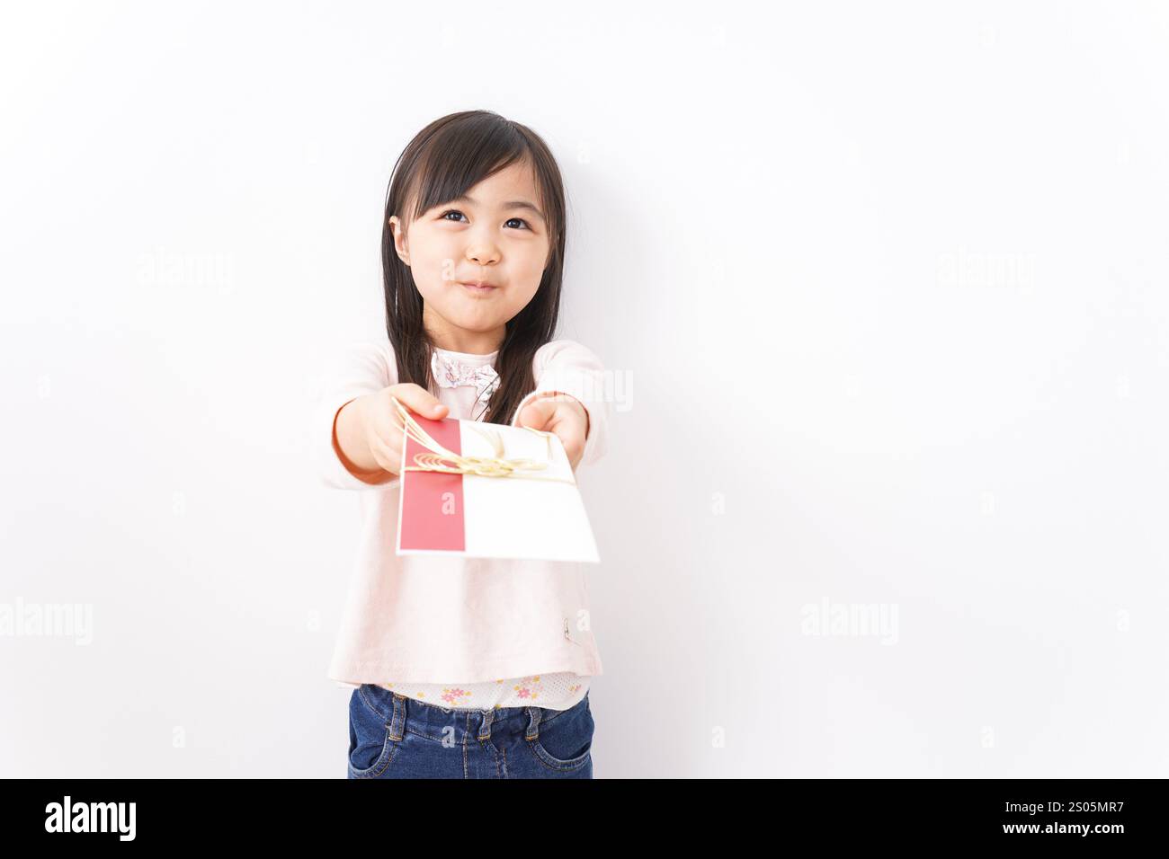 Small child handing over congratulations Stock Photo - Alamy