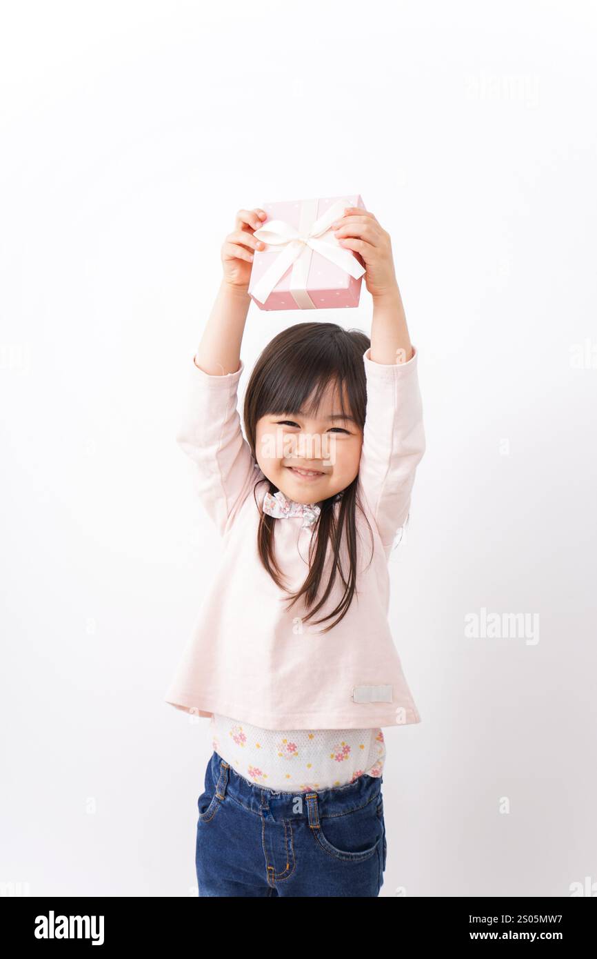 Children giving presents Stock Photo - Alamy