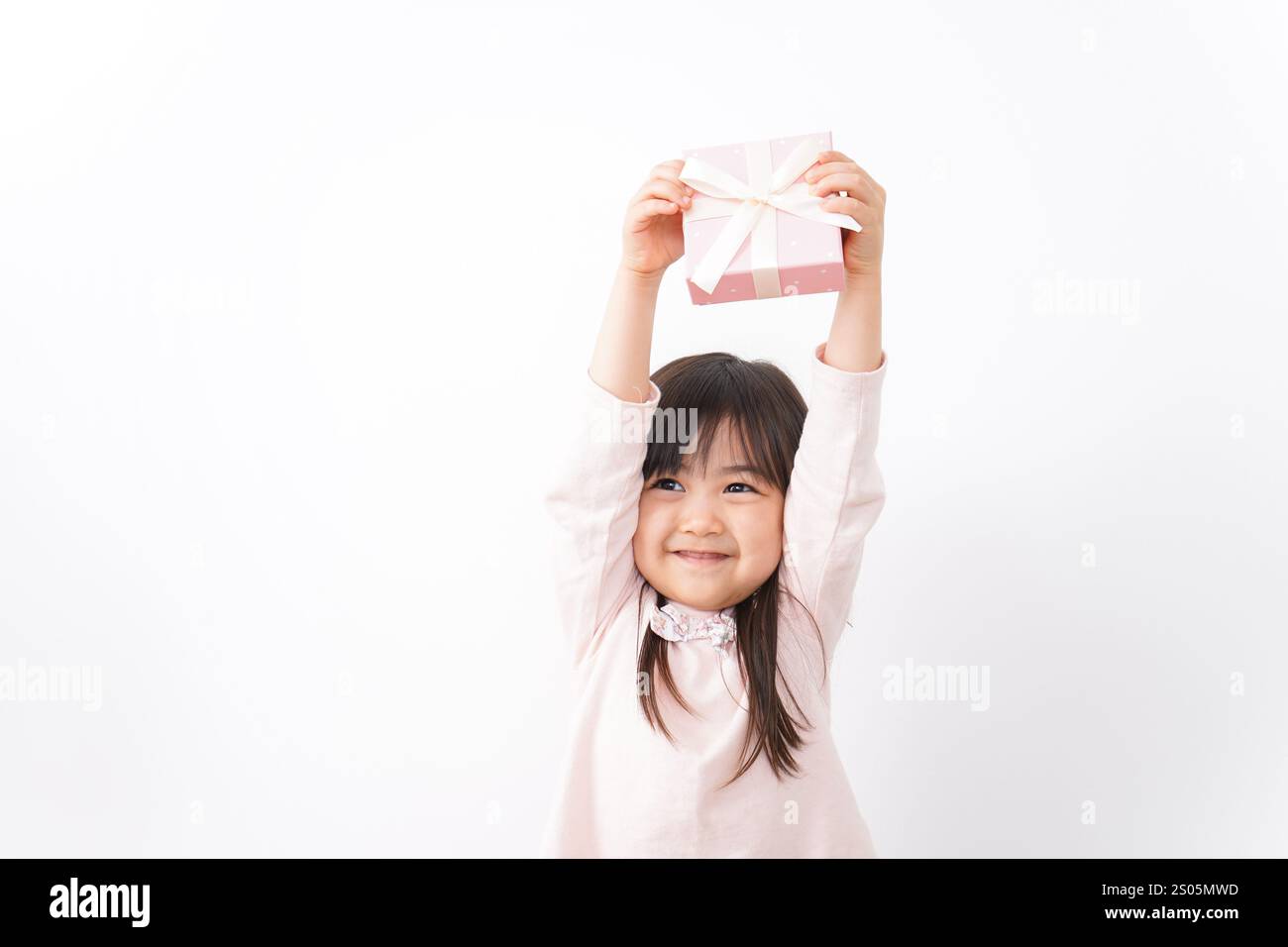 Children giving presents Stock Photo - Alamy