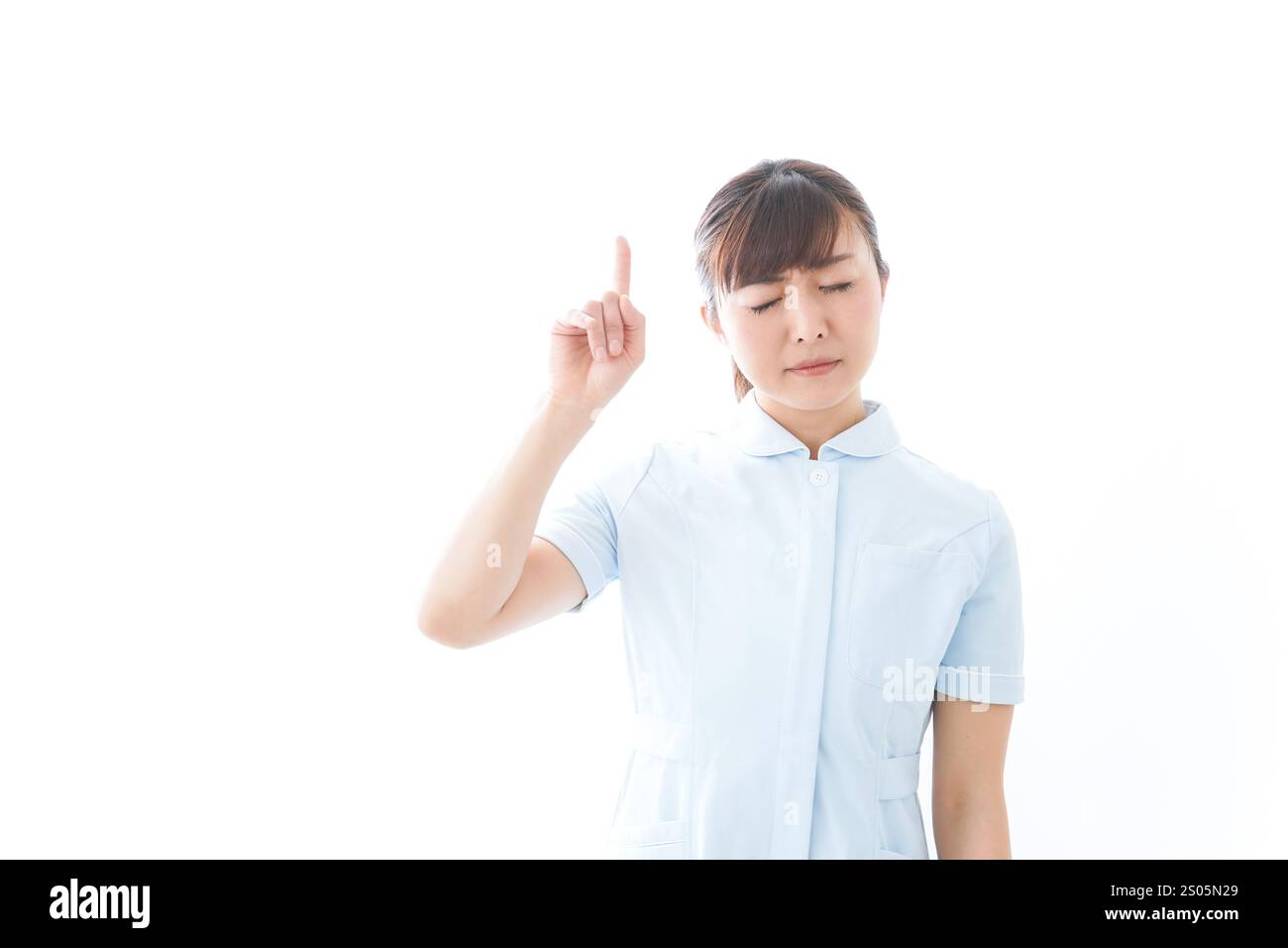 Young nurse signing NO Stock Photo - Alamy
