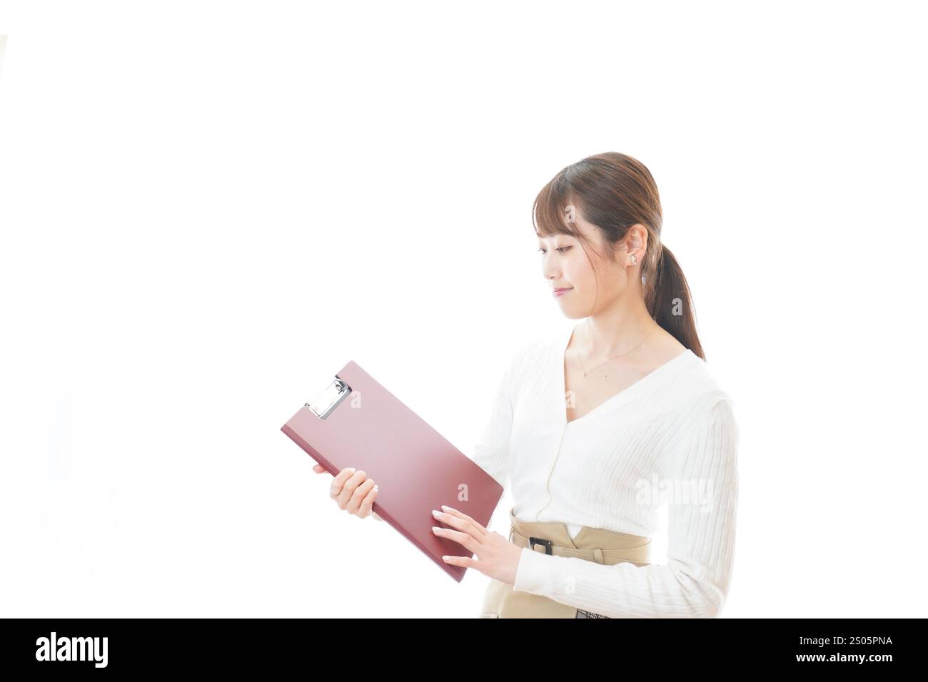 College student holding file Cut Out Stock Images & Pictures - Alamy