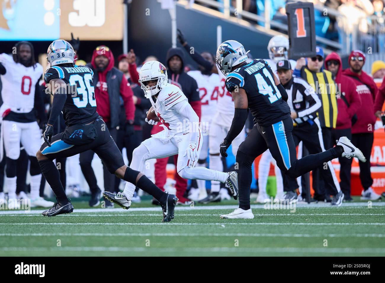 Arizona Cardinals wide receiver Greg Dortch (4) looks to avoid being ...