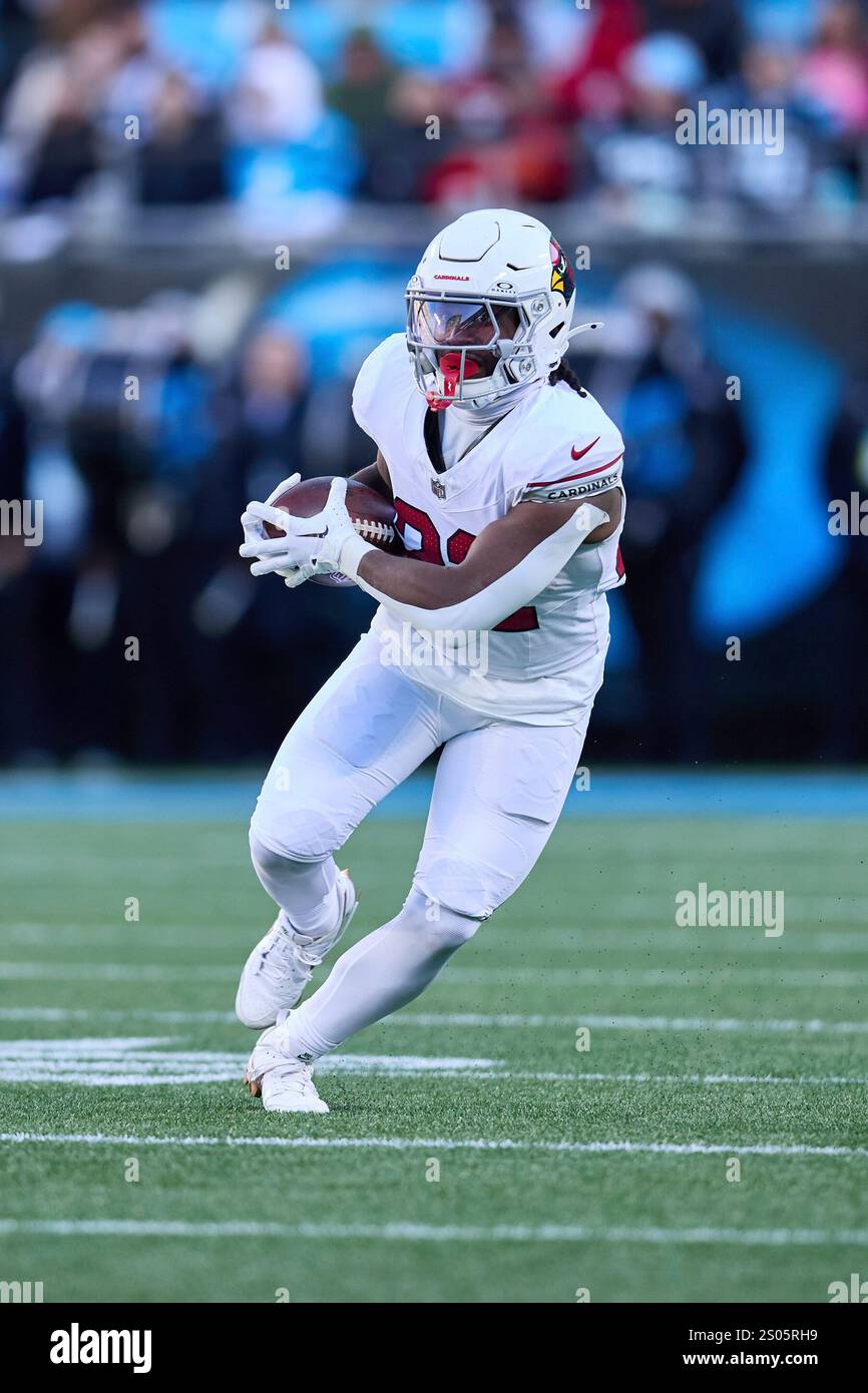 Arizona Cardinals running back Michael Carter (22) runs with the ball ...