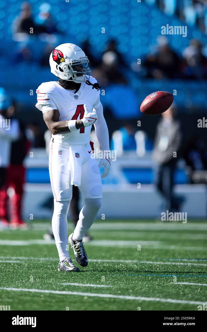 Arizona Cardinals wide receiver Greg Dortch (4) tosses a ball during ...