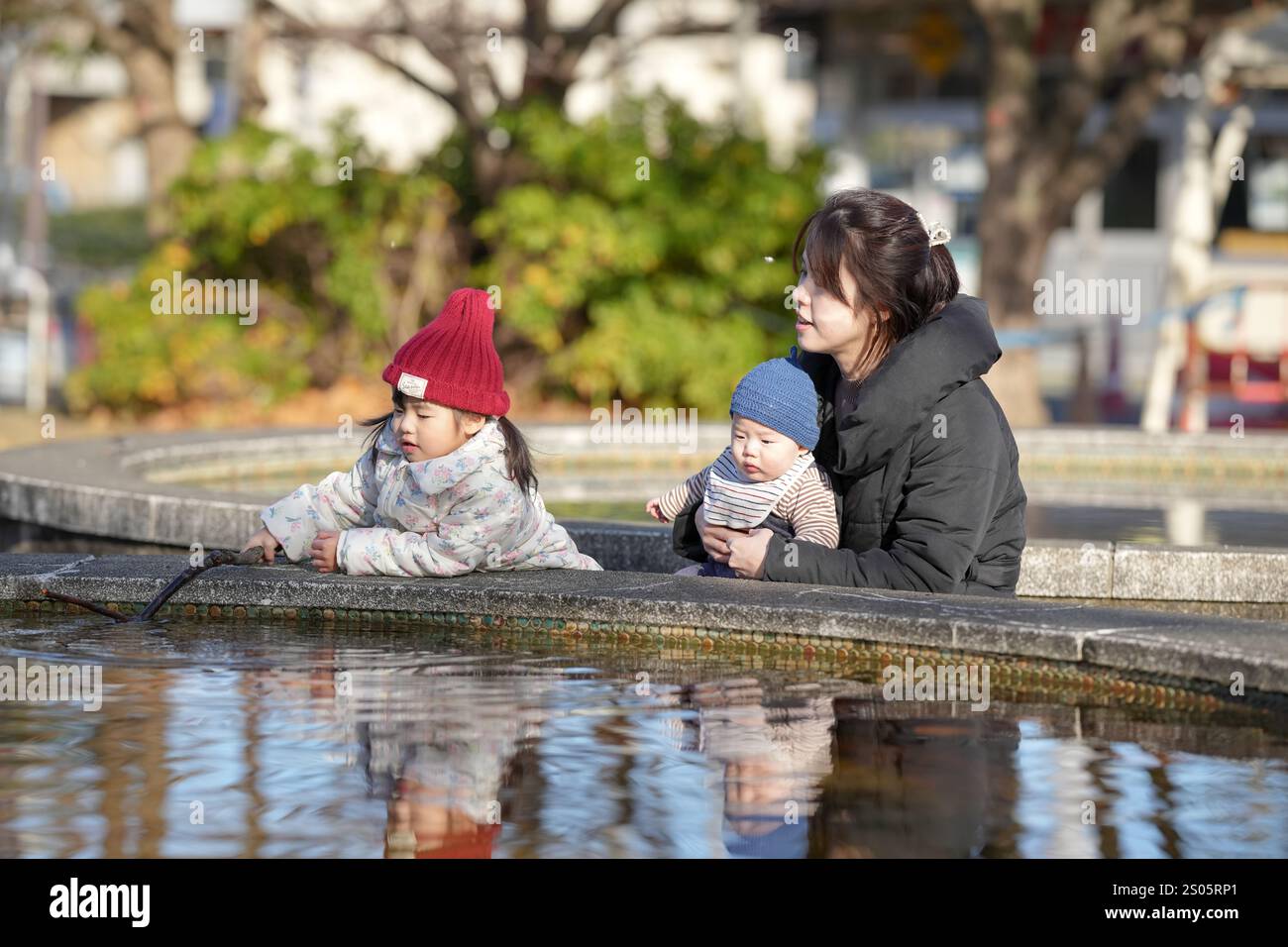 A five-month-old baby, a three-year-old girl, and a Japanese woman in ...