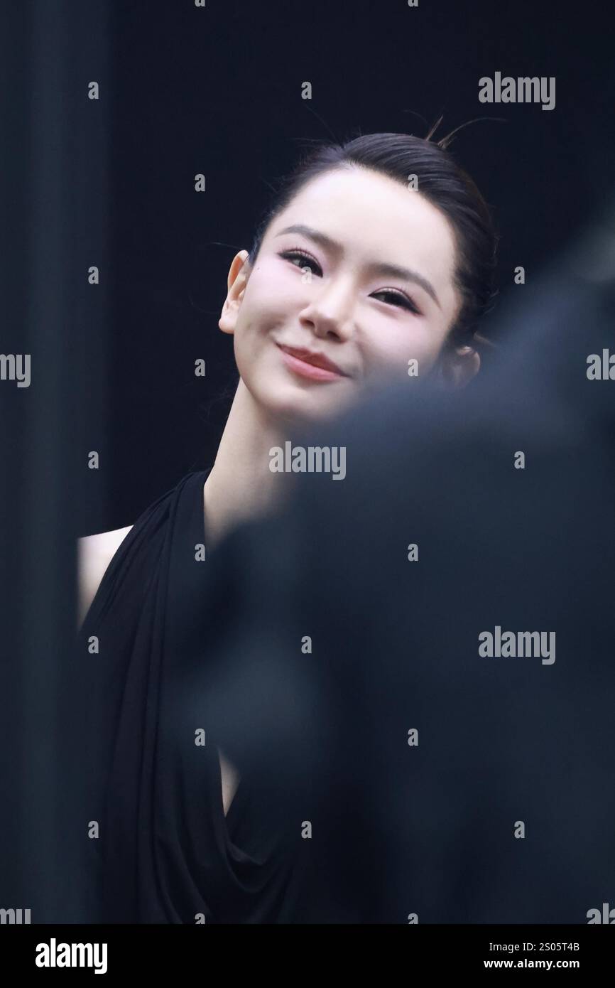 Chinese singer and actress Stephy Qi attends an activity in Chengdu ...