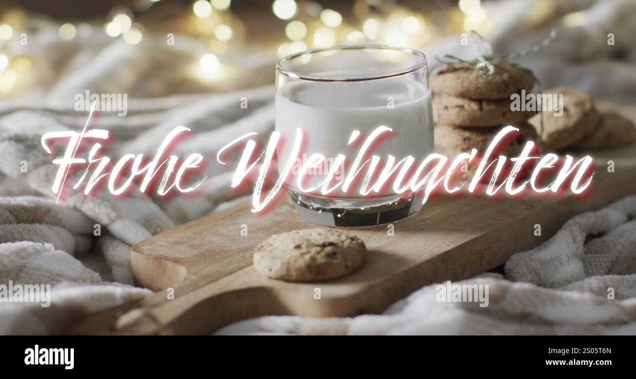 Frohe weihnachten text in white over christmas cookies and milk with ...