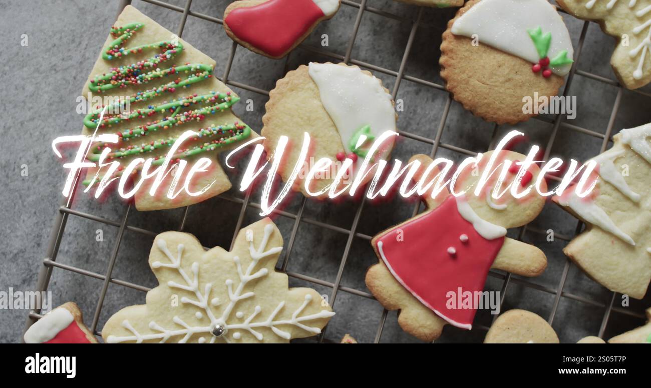 Frohe weihnachten text in white over decorated christmas cookies ...