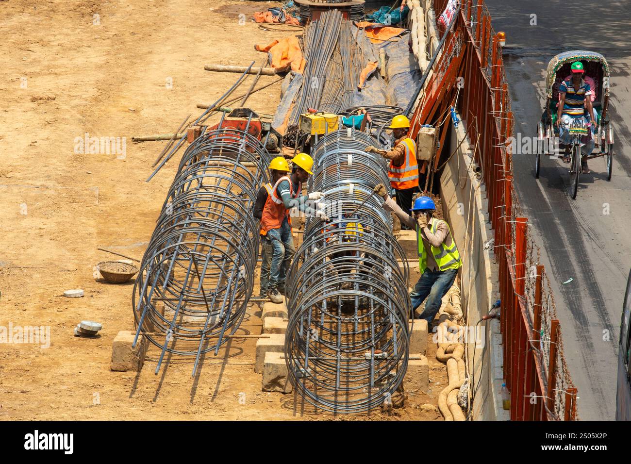 Workers assemble rebar cages for the First Dhaka Elevated Expressway ...