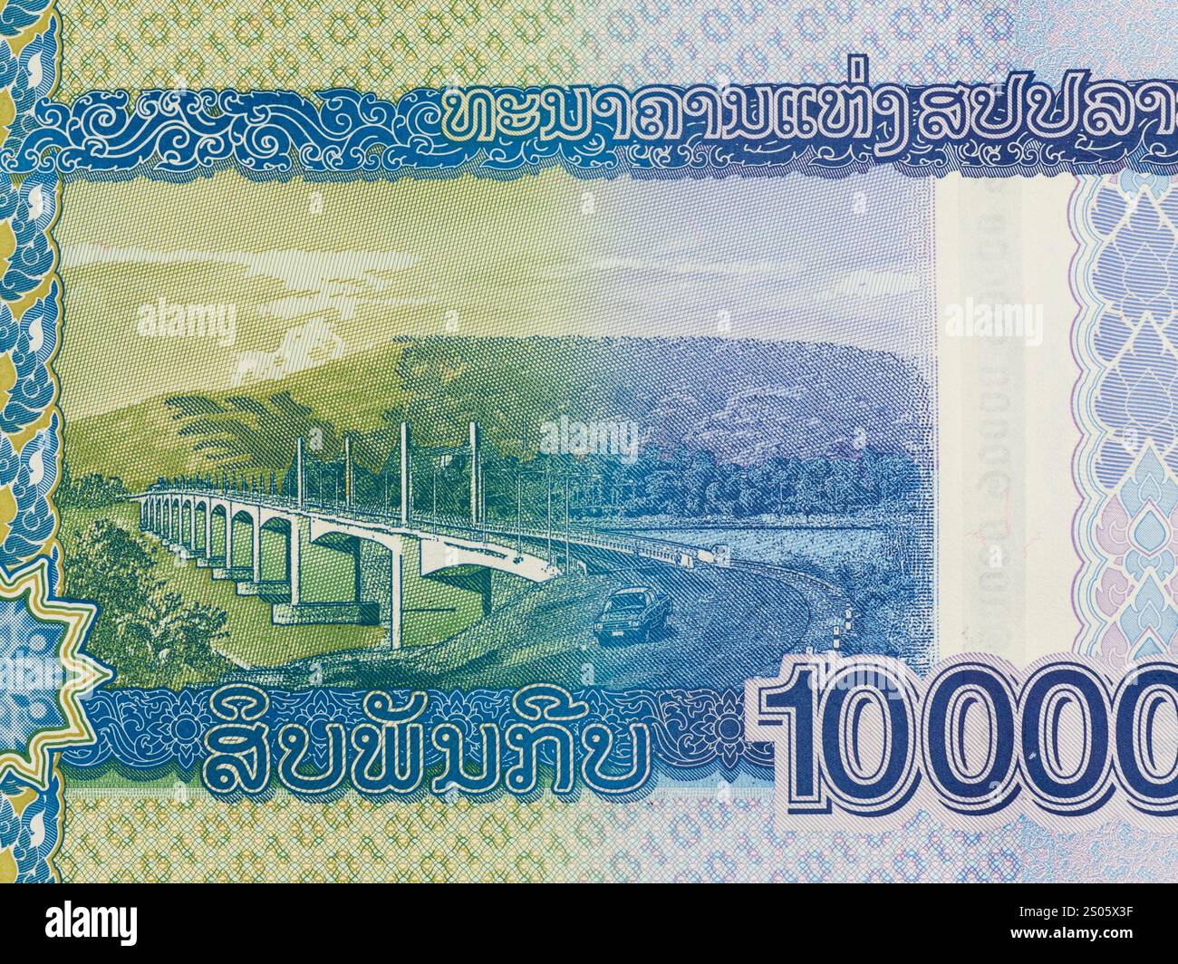 Portrait of mekong river, pha that luang pagoda and lao-nippon bridge ...