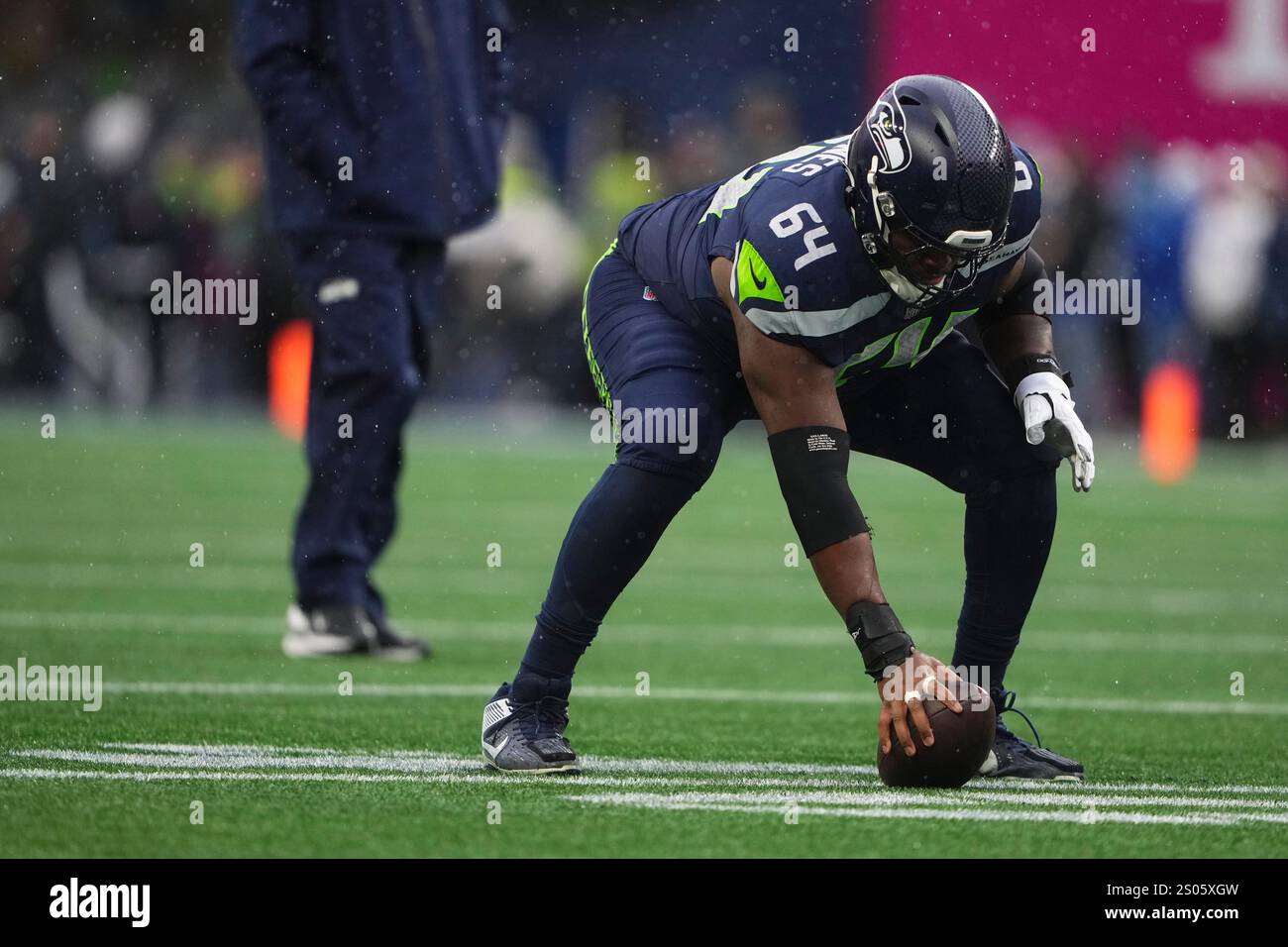 Seattle Seahawks guard Christian Haynes warms up before an NFL football ...