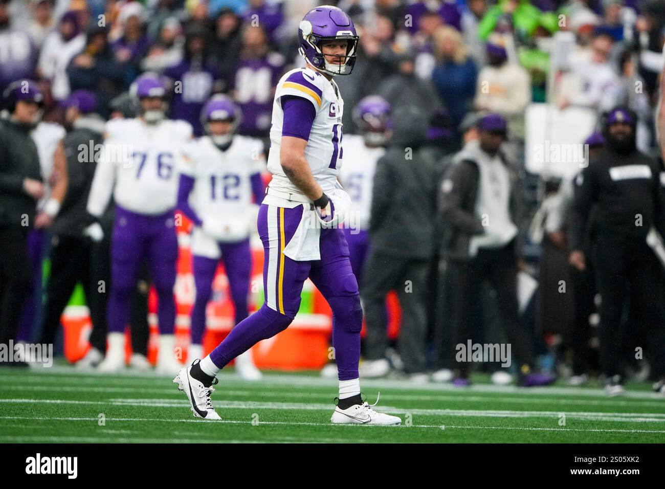 Minnesota Vikings quarterback Sam Darnold looks on during an NFL ...