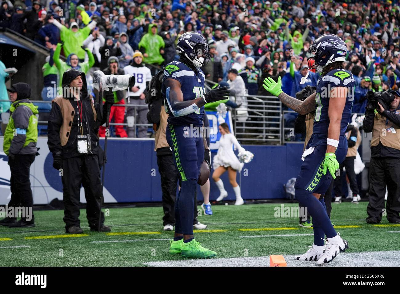 Seattle Seahawks wide receiver DK Metcalf, left, greets wide receiver ...