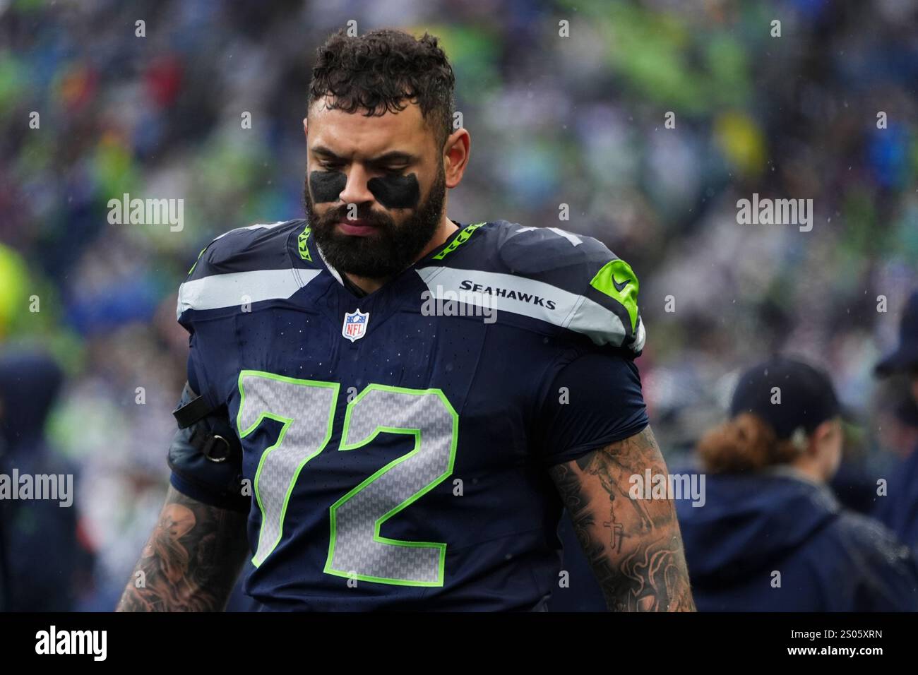 Seattle Seahawks offensive tackle Abraham Lucas walks on the sideline ...