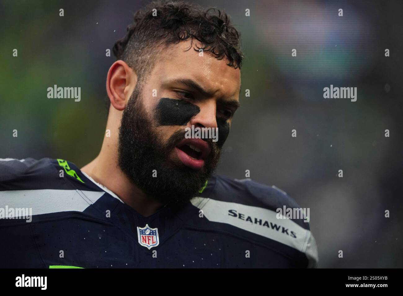 Seattle Seahawks offensive tackle Abraham Lucas walks on the sideline ...
