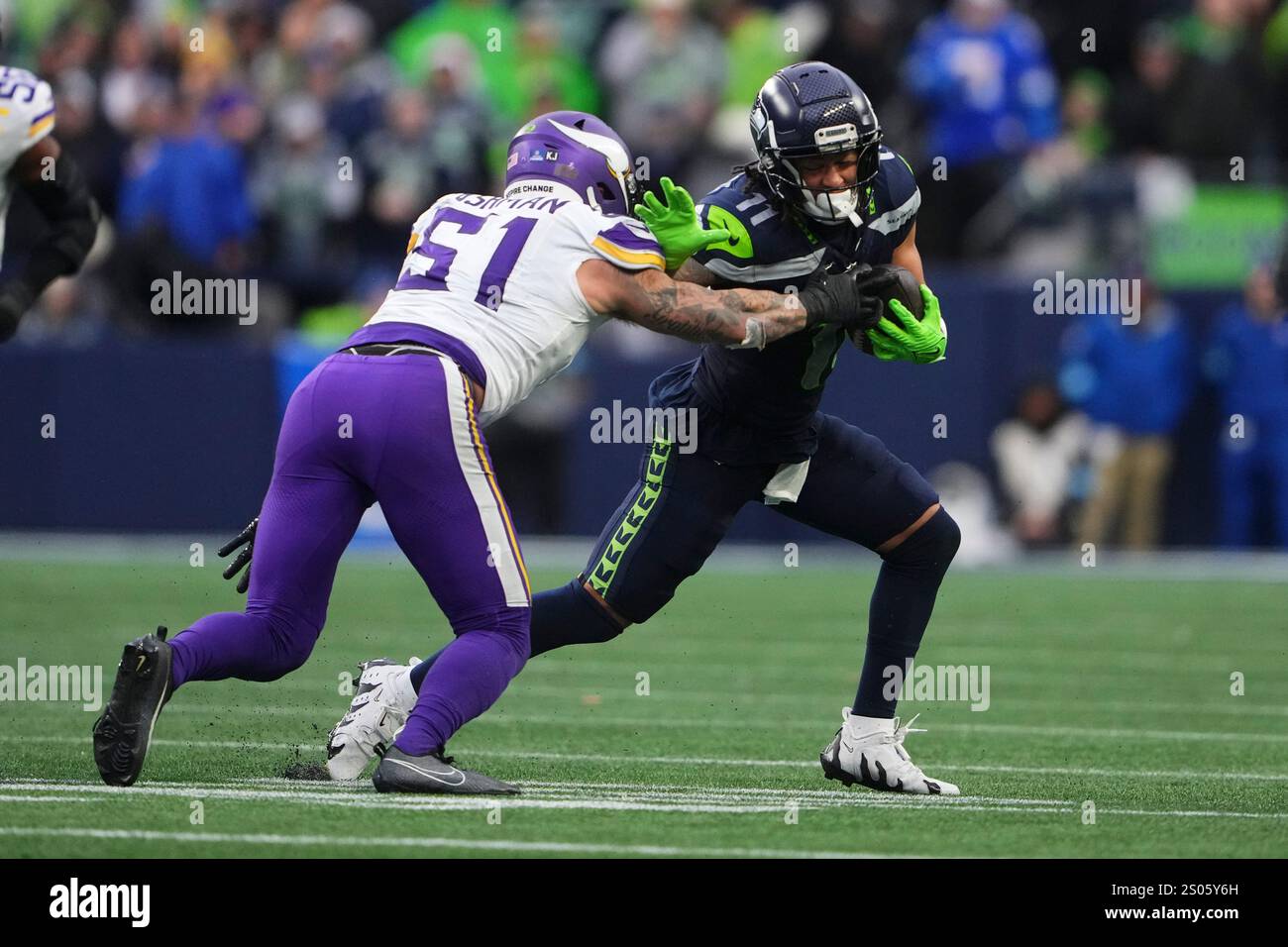 Seattle Seahawks wide receiver Jaxon Smith-Njigba runs the ball against ...
