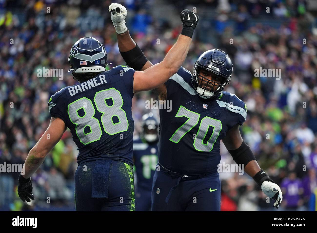 Seattle Seahawks tight end AJ Barner (88) reacts to scoring a touchdown ...