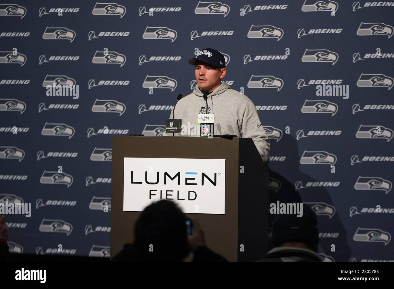 Seattle Seahawks head coach Mike Macdonald speaks to the media after an ...