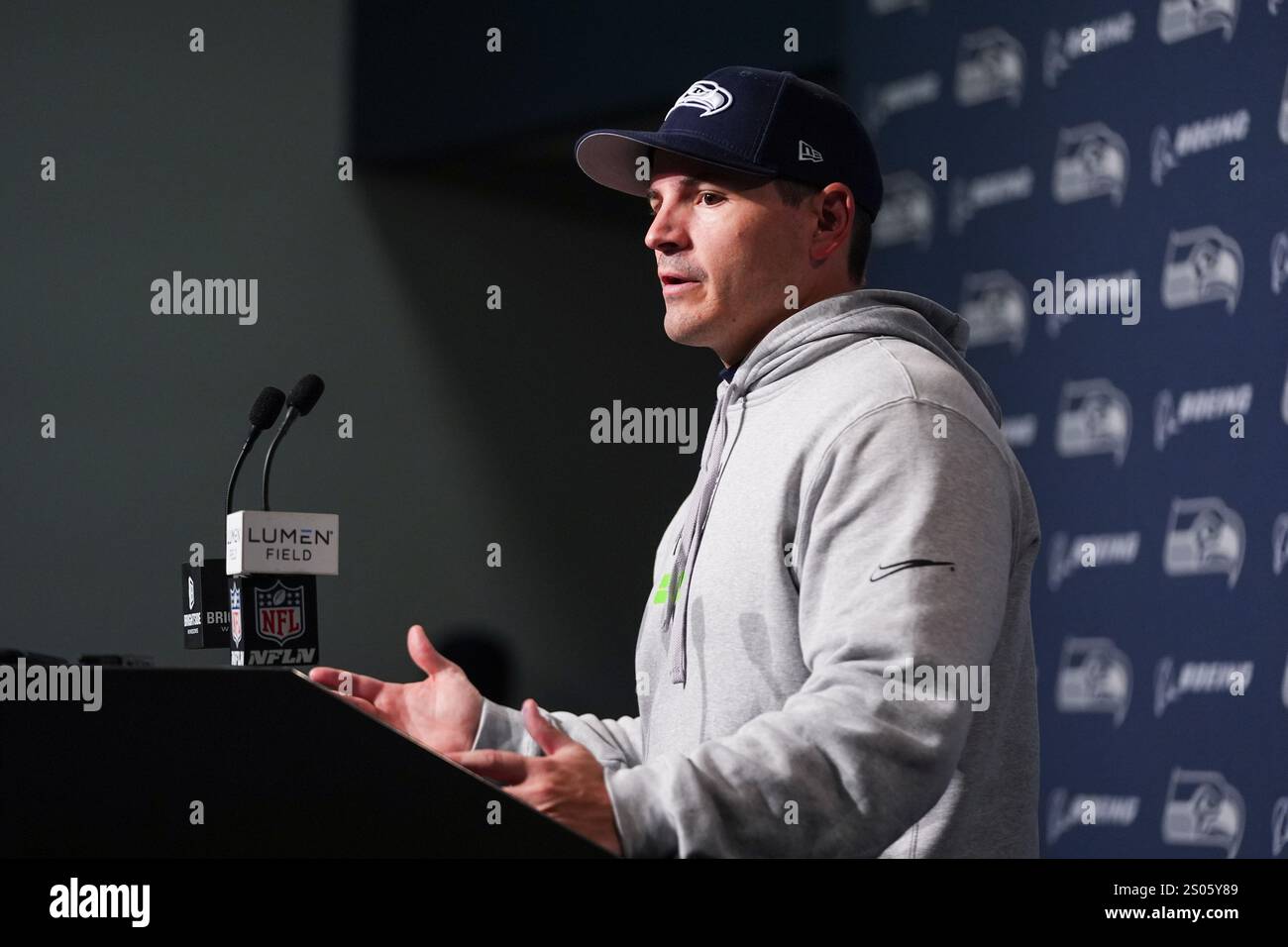 Seattle Seahawks head coach Mike Macdonald speaks to the media after an ...