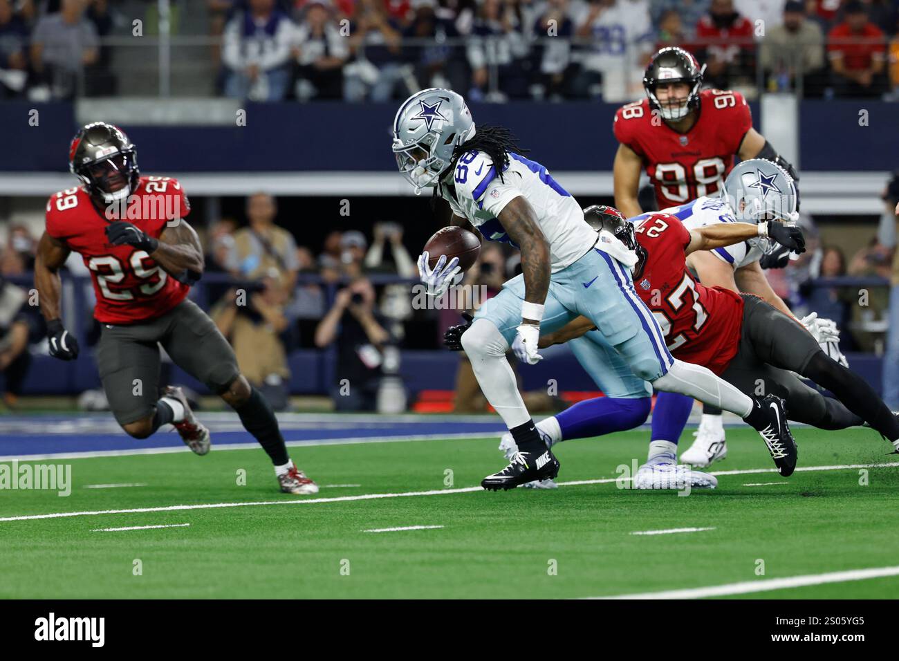 Dallas Cowboys wide receiver CeeDee Lamb (88) carries the ball after a ...