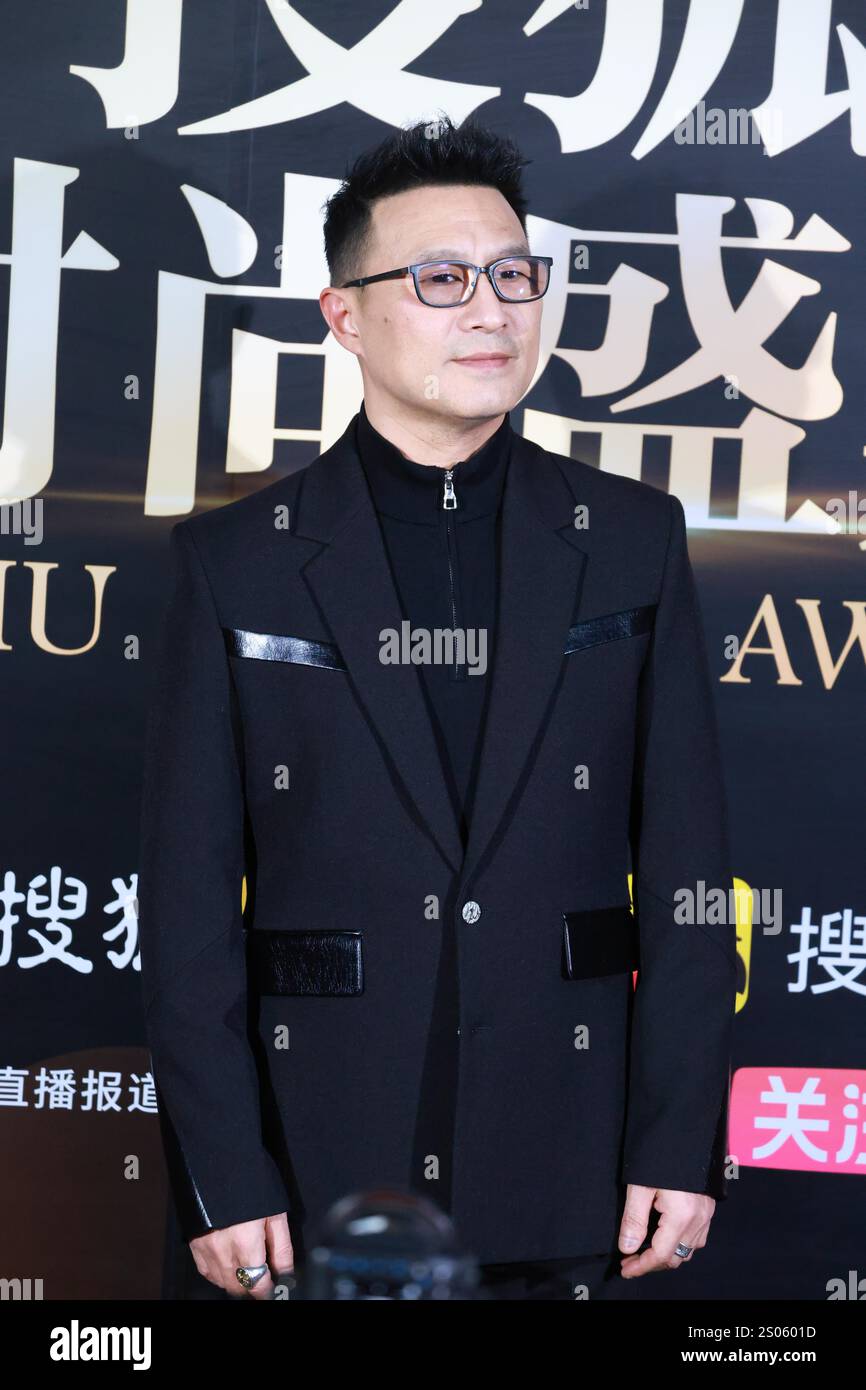 Chinese rock musician Wang Feng attends an activity in Beijing, China ...