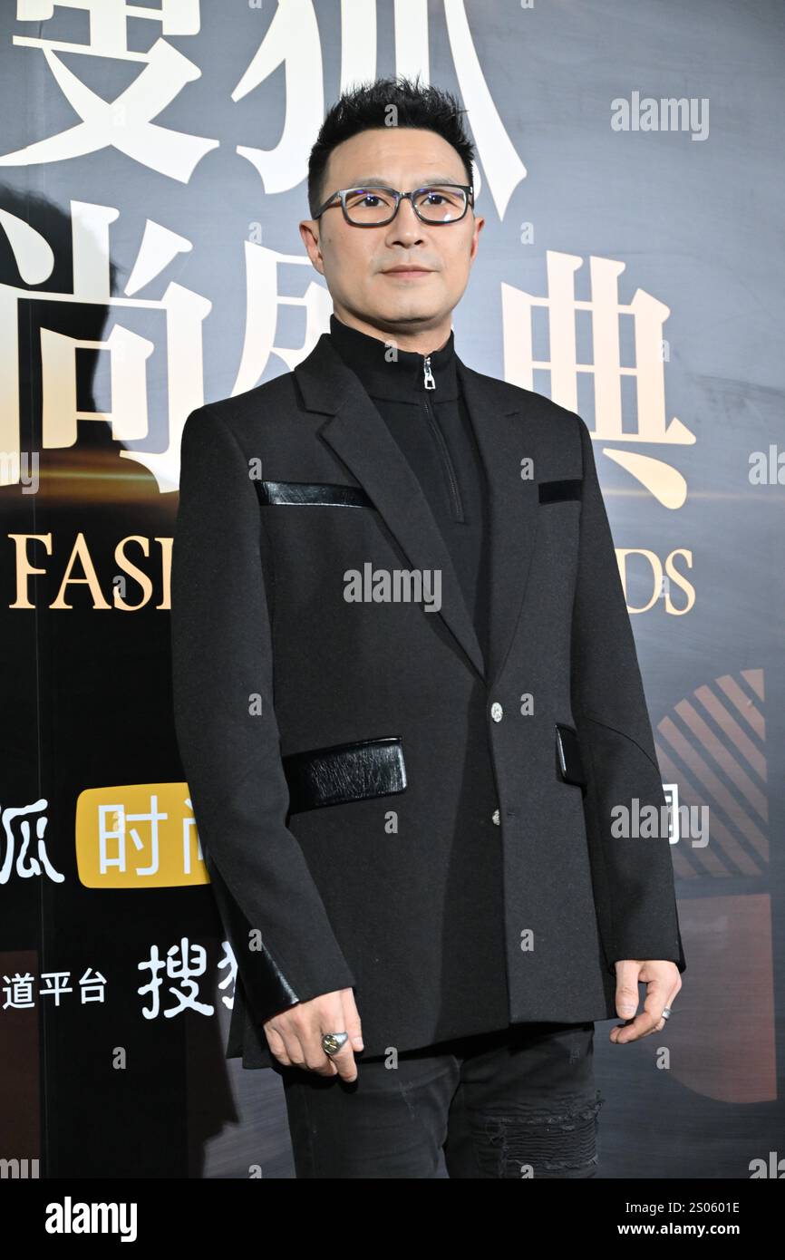 Chinese rock musician Wang Feng attends an activity in Beijing, China ...