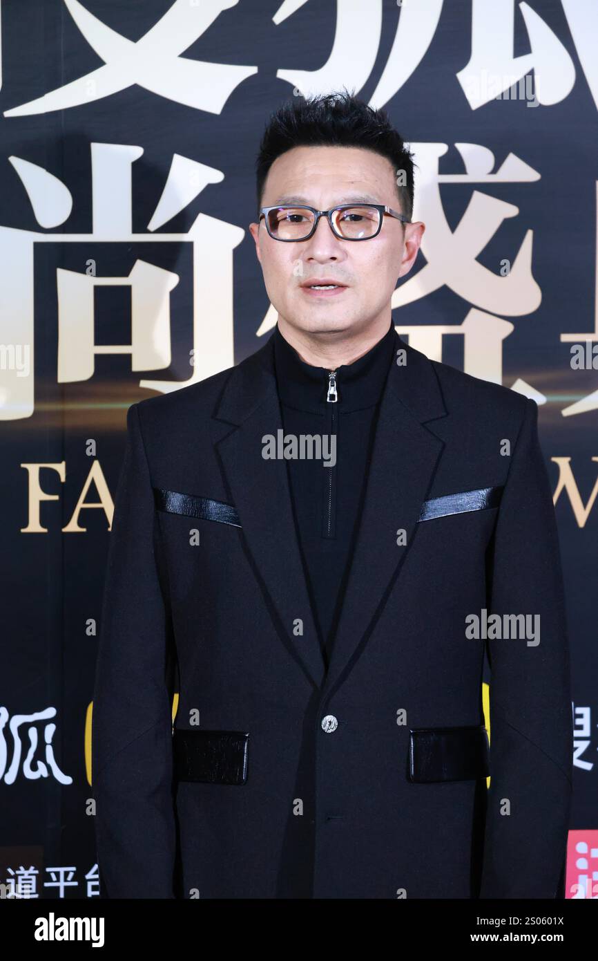 Chinese rock musician Wang Feng attends an activity in Beijing, China ...