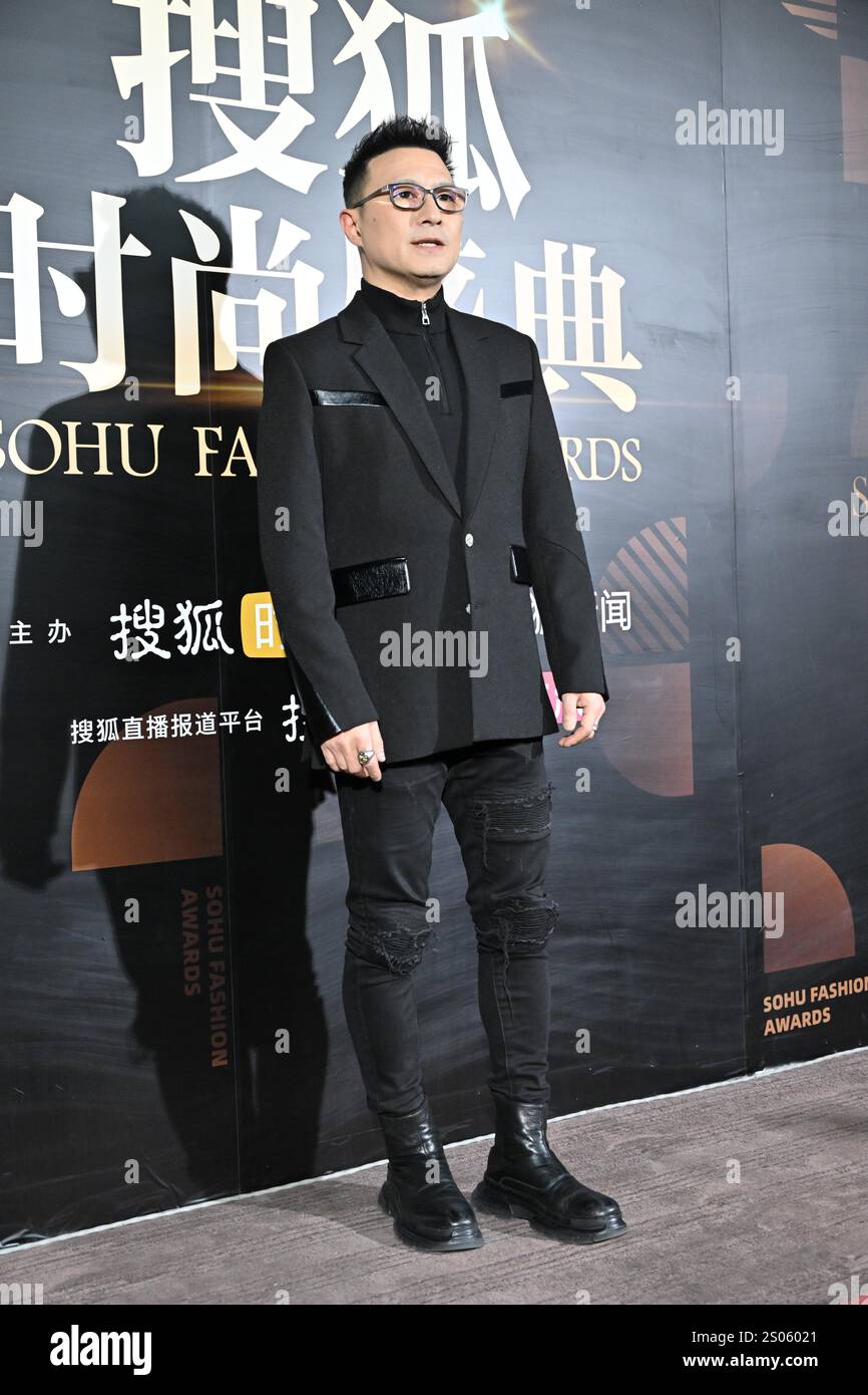 Chinese rock musician Wang Feng attends an activity in Beijing, China ...
