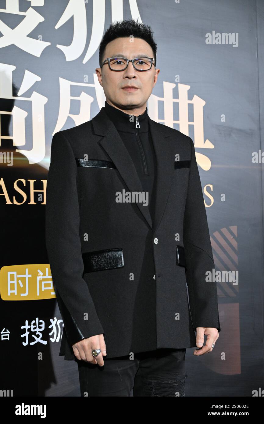 Chinese rock musician Wang Feng attends an activity in Beijing, China ...