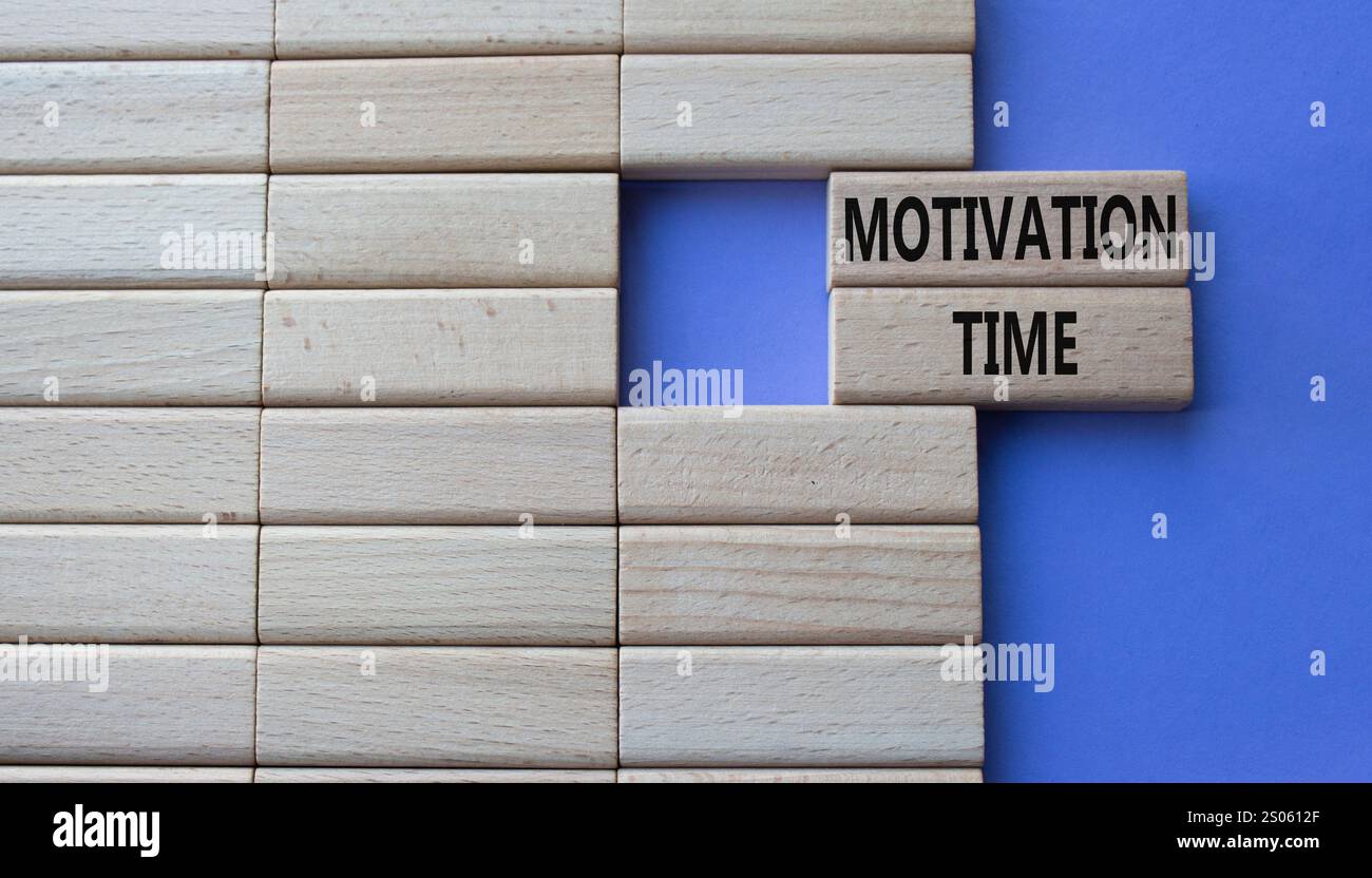 Motivation Time symbol. Concept word Motivation Time on wooden blocks ...