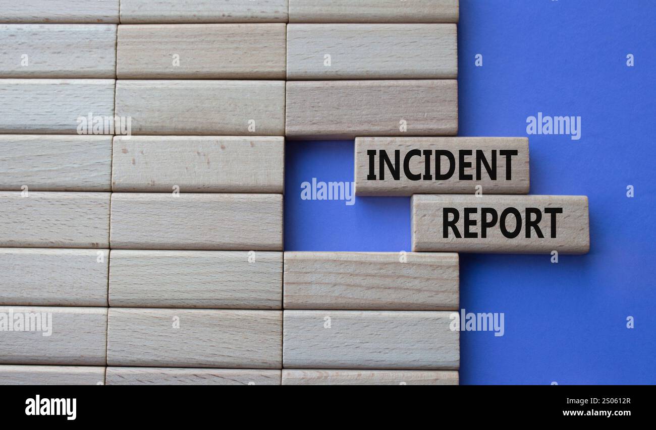 Incident Report symbol. Concept word Incident Report on wooden blocks ...