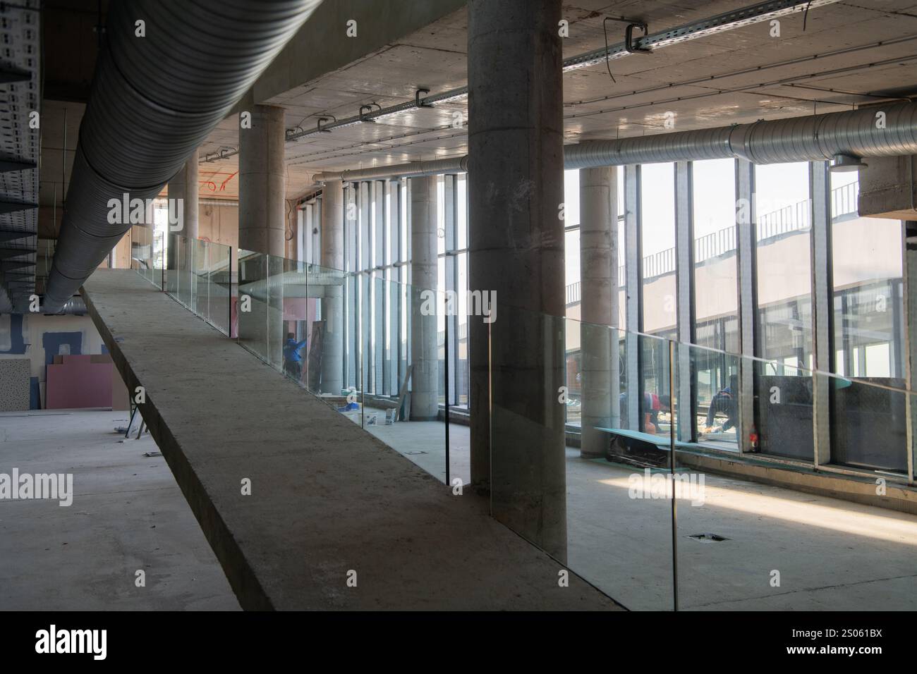 A captivating view of a modern business building under construction ...