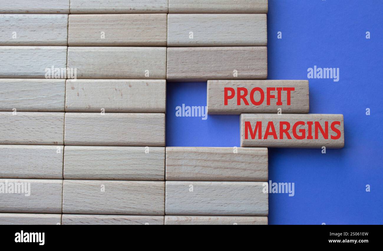 Profit Margins symbol. Concept word Profit Margins on wooden blocks ...