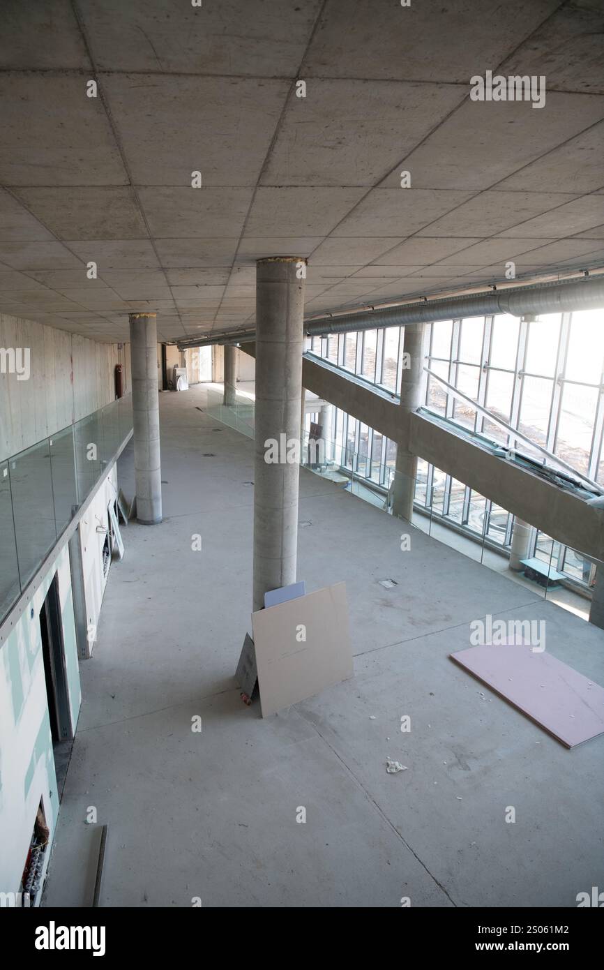 A captivating view of a modern business building under construction ...