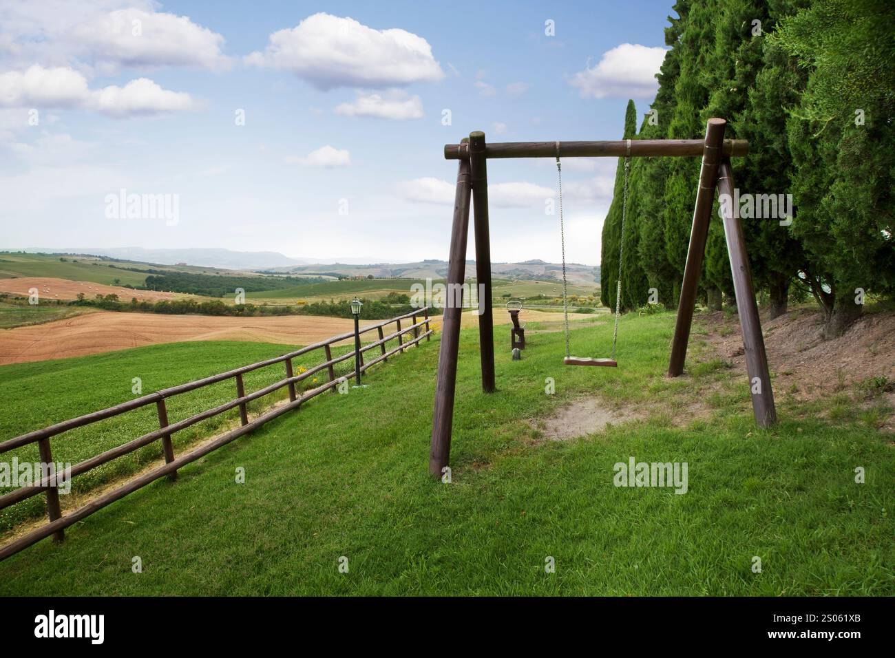 Rural swing in resting place at summer Stock Photo - Alamy