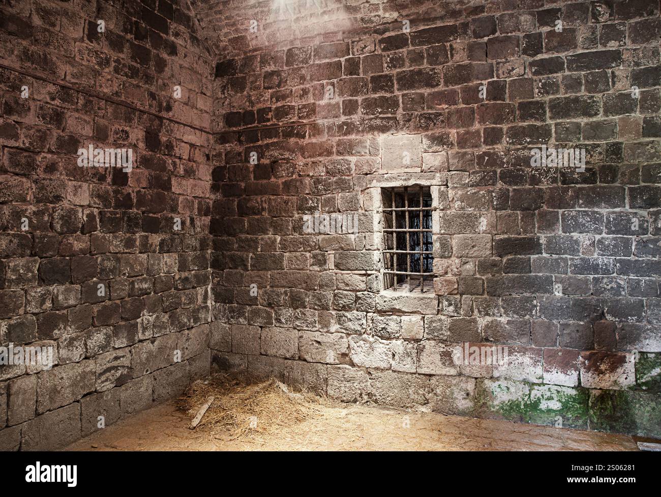 An abandoned prison cell at ancient castle Rocca in Radicofani. Italy ...