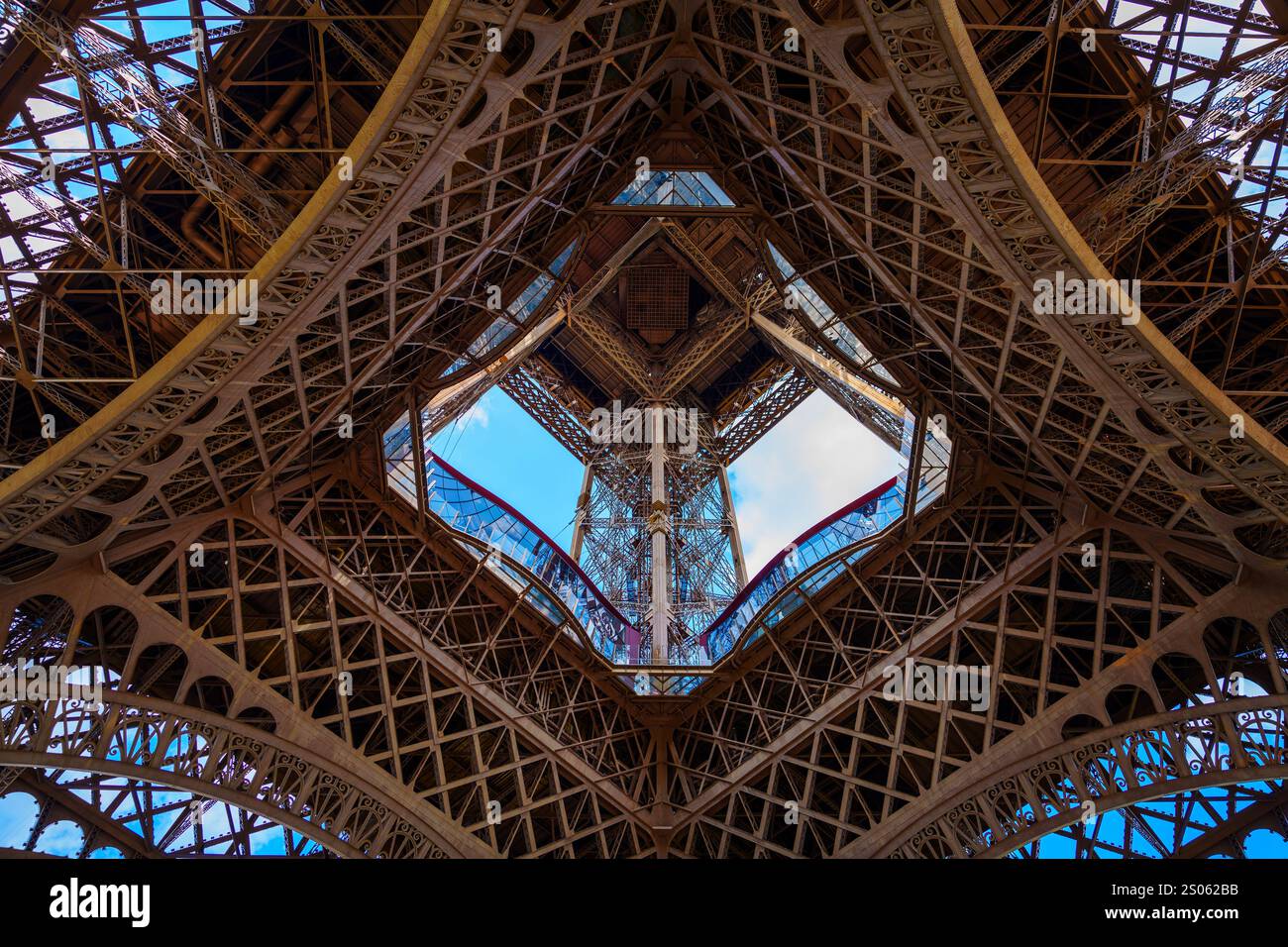 Eiffel Tower from below, looking up through its intricate metal ...