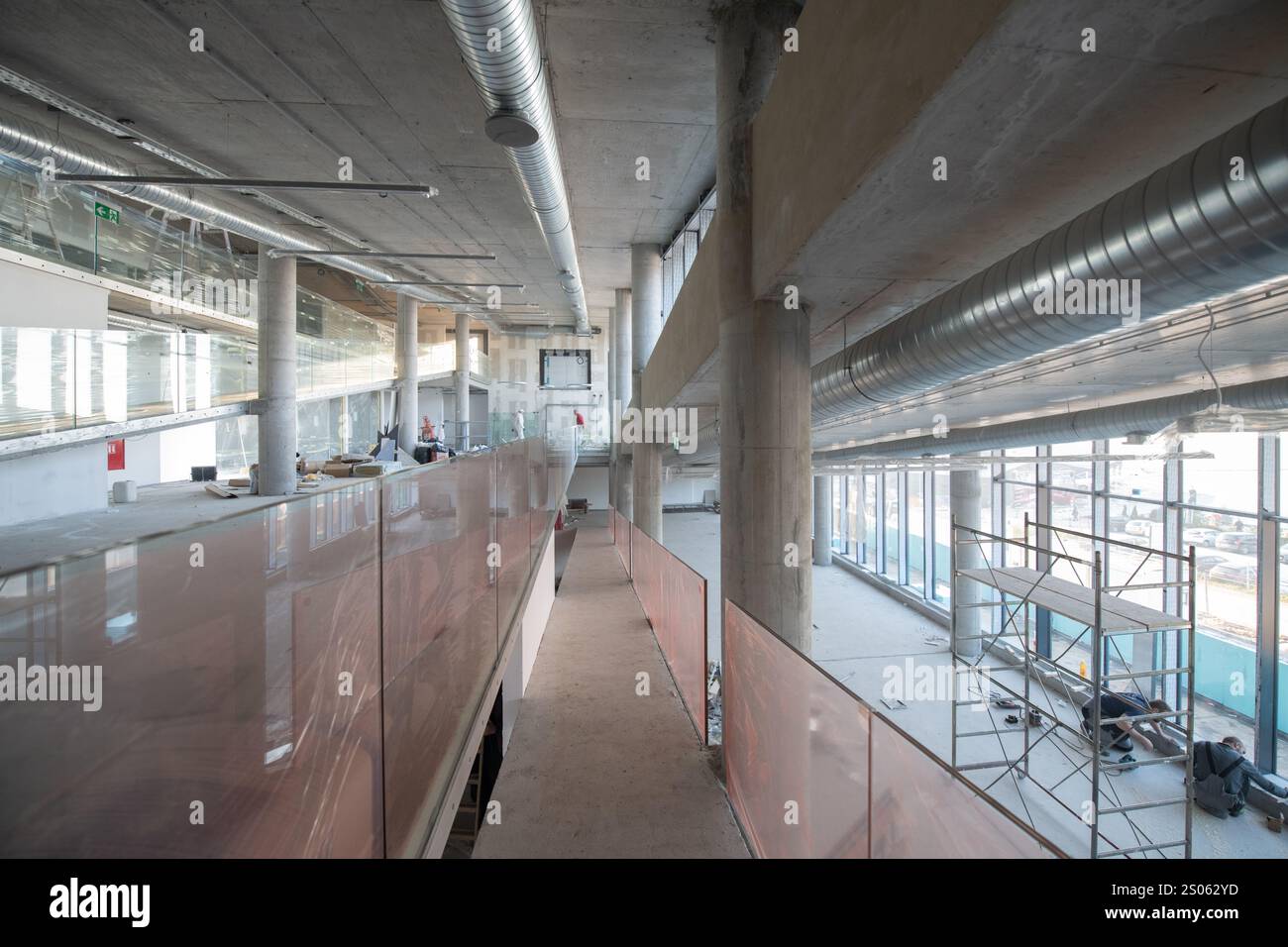 A captivating view of a modern business building under construction ...