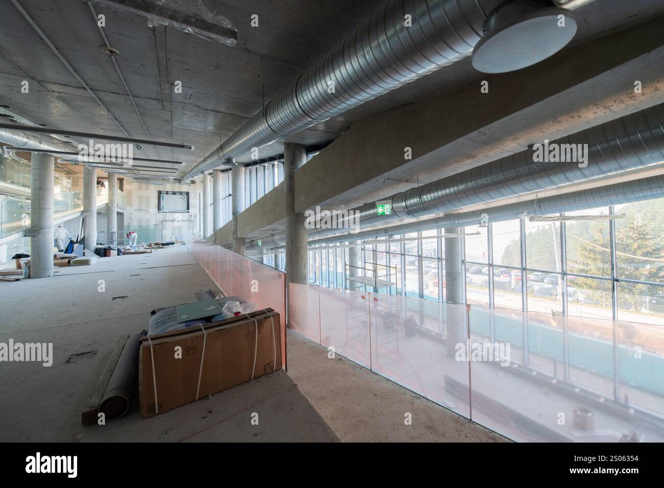 A captivating view of a modern business building under construction ...